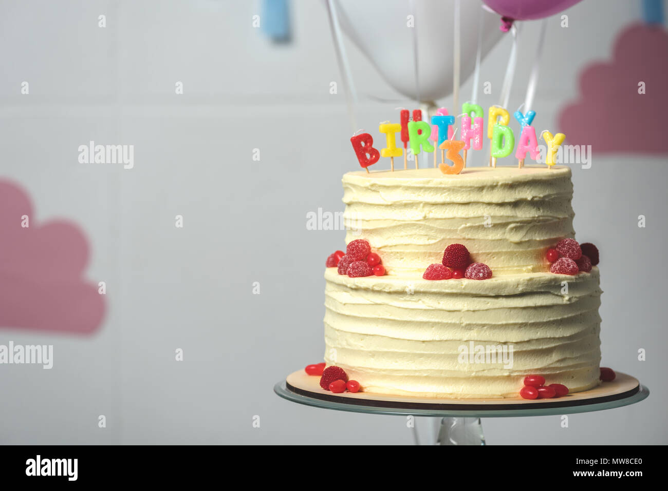 close-up view of delicious birthday cake with number three on top Stock ...