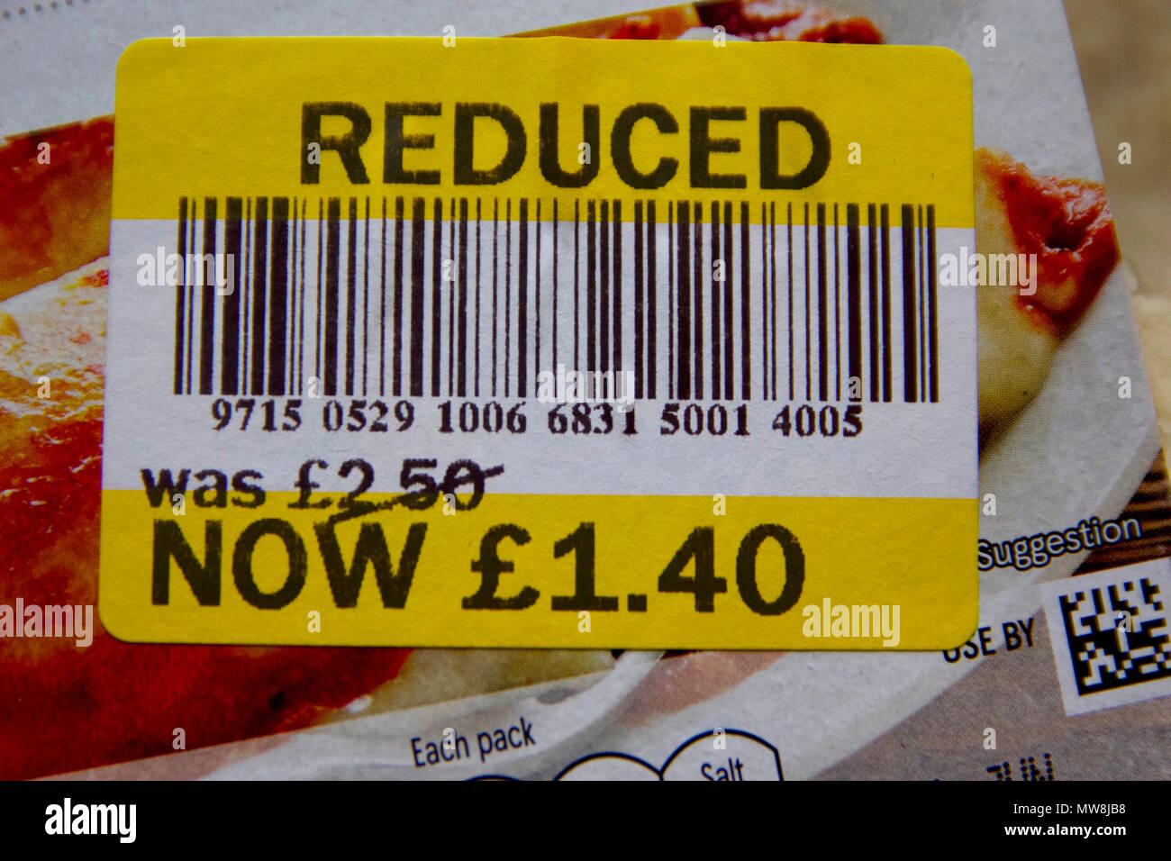 A Tesco Reduced Food Label For A Ready Meal That Is About To Expire a-tesco-reduced-food-label-for-a-ready-meal-that-is-about-to-expire