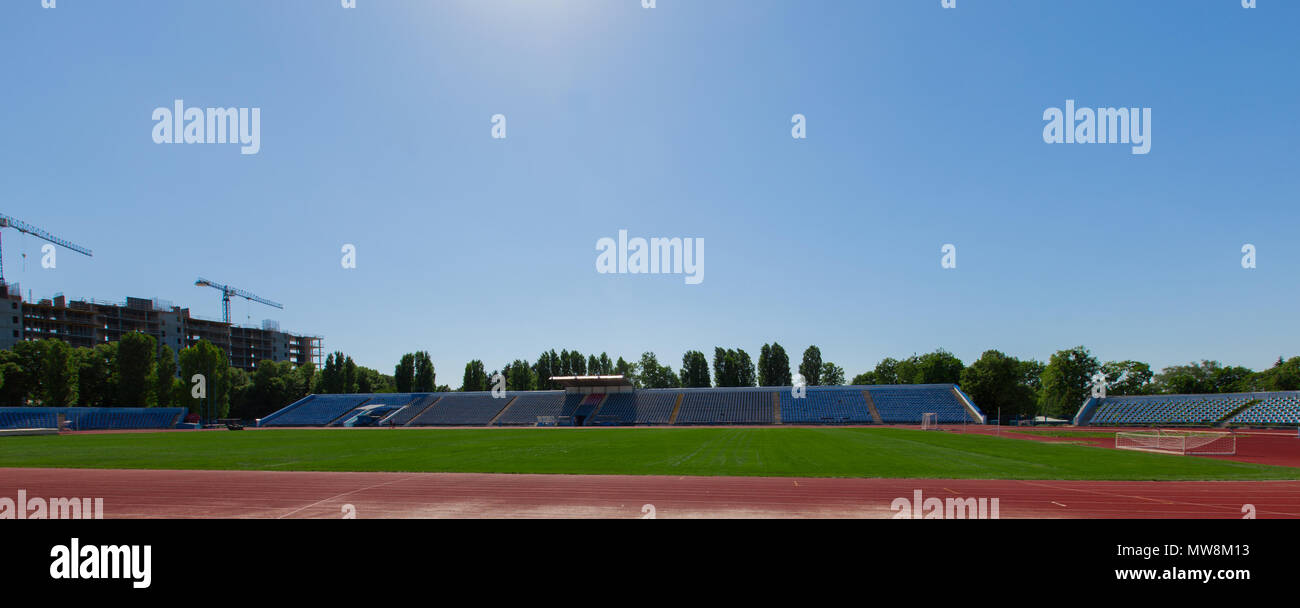 small province stadium with a running track and a football field ...