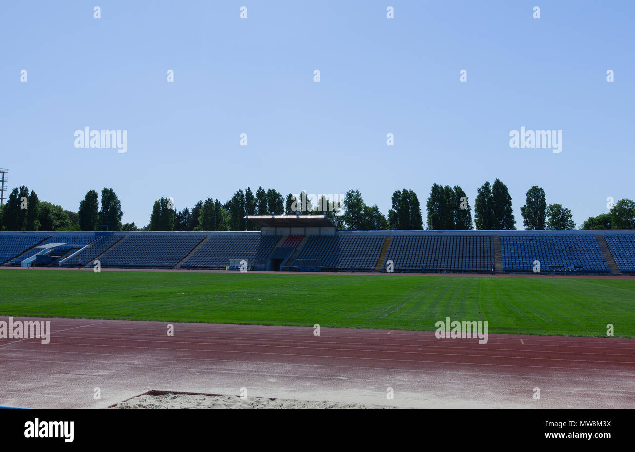small province stadium with a running track and a football field ...