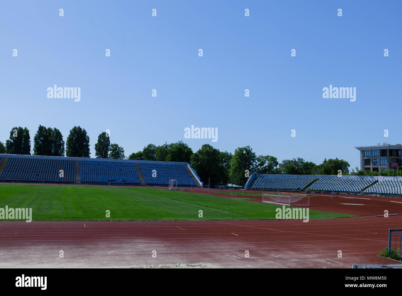 small province stadium with a running track and a football field ...
