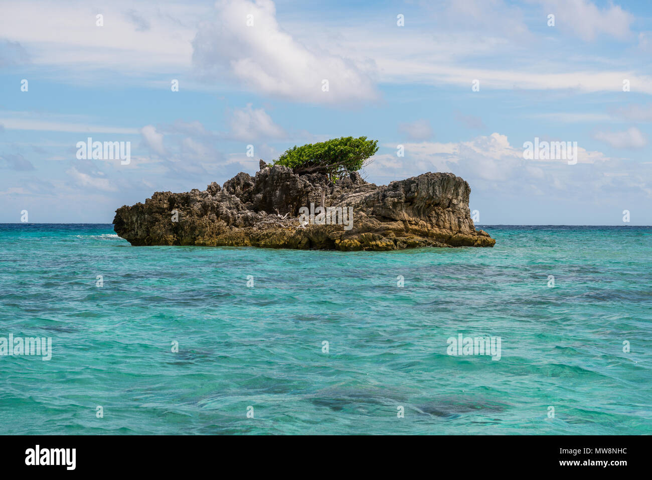 East Misool, group of small limestone islands in shallow blue lagoon ...