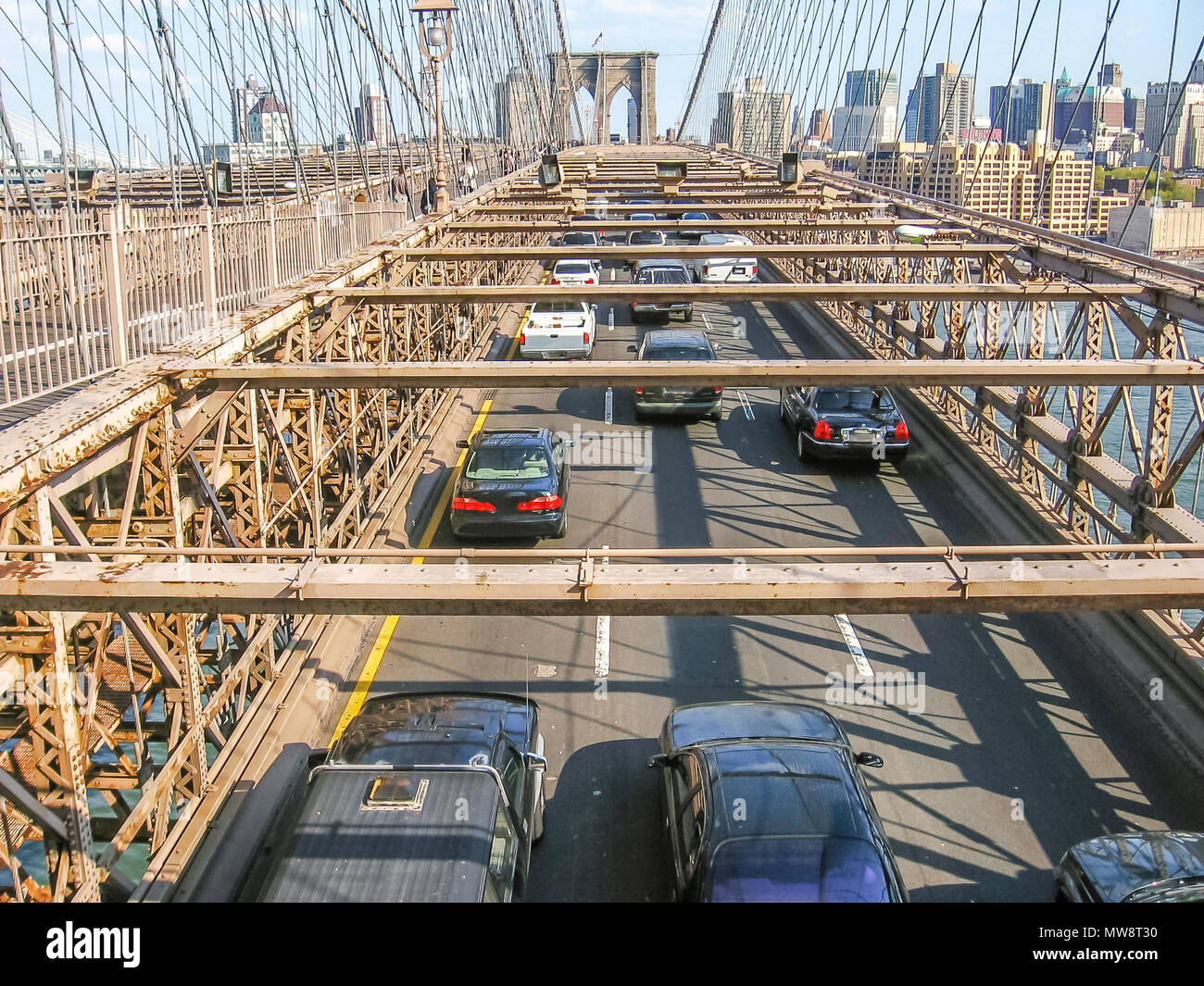Aerial view of a number of cars cross the famous Brooklyn Bridge with ...