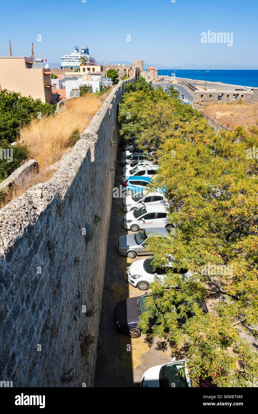 View of parking lot next to city walls in City of Rhodes (Rhodes ...