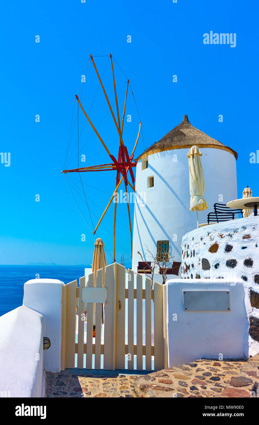Old white windmill in Oia in Santorini, Greece Stock Photo - Alamy