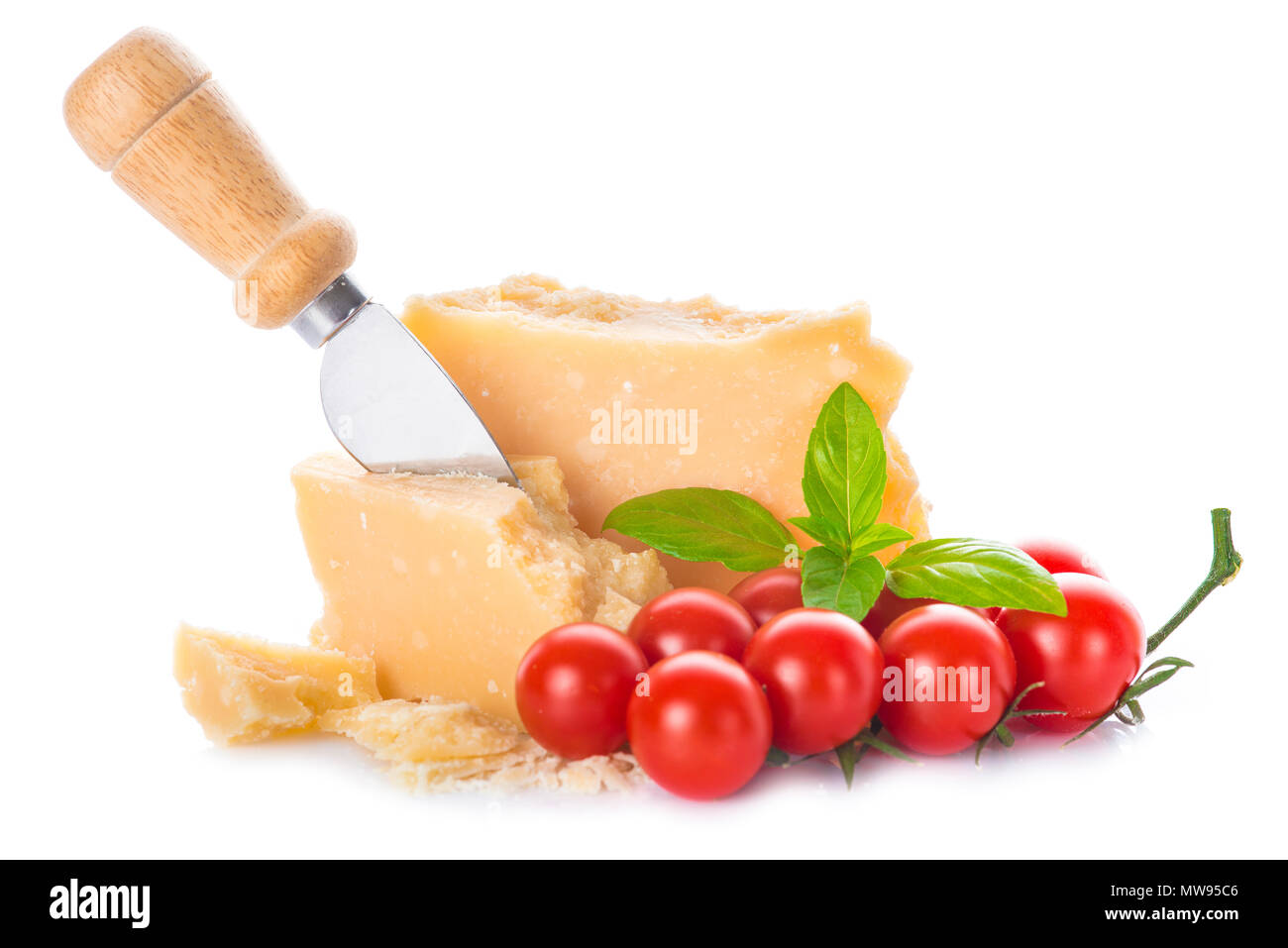 Parmesan cheese or parmigiano reggiano with cherry tomatoes and basil ...