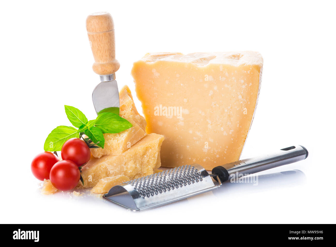 Parmesan cheese or parmigiano reggiano with cherry tomatoes and basil ...