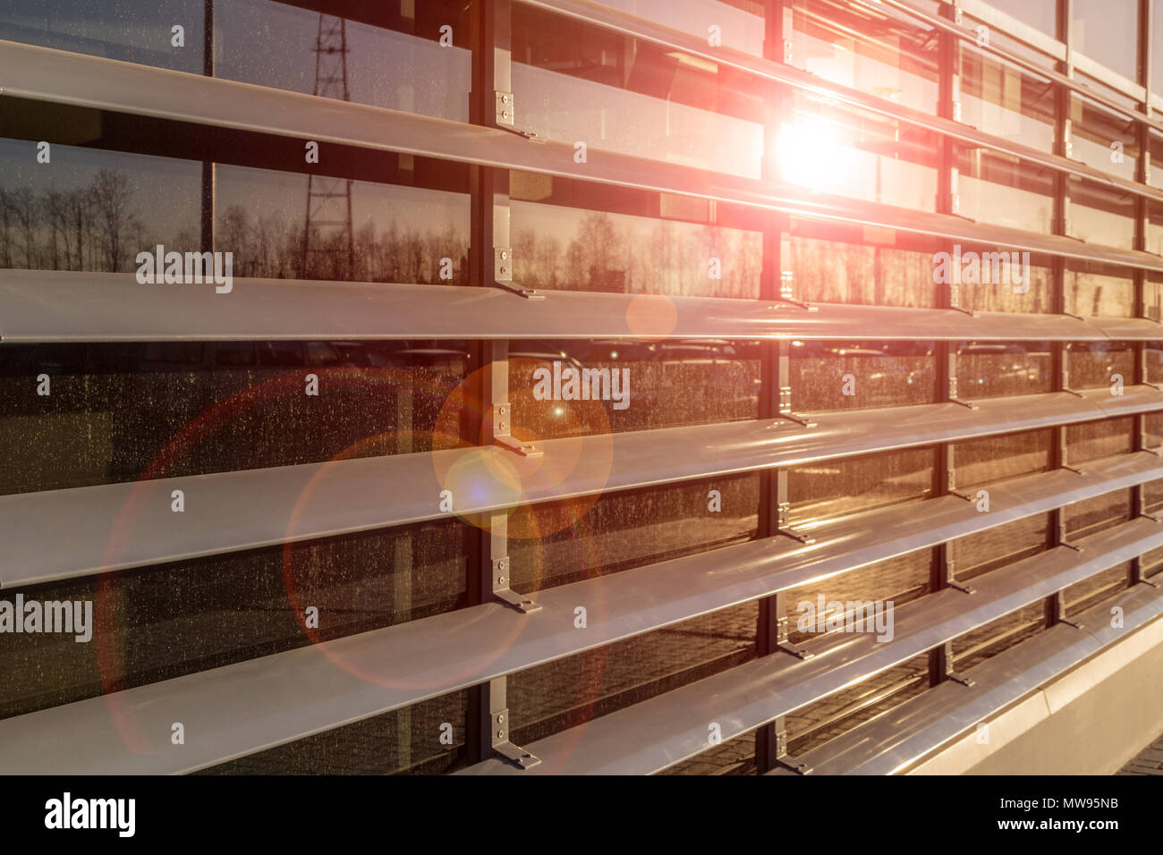 Reflection of the sun with glare from the window with a lattice Stock ...