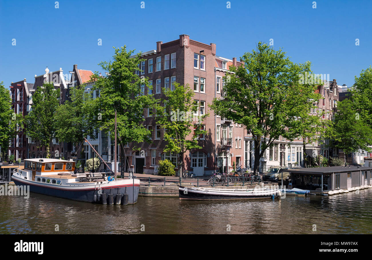 Beautiful landscape with medieval houses and boats on the canal in ...