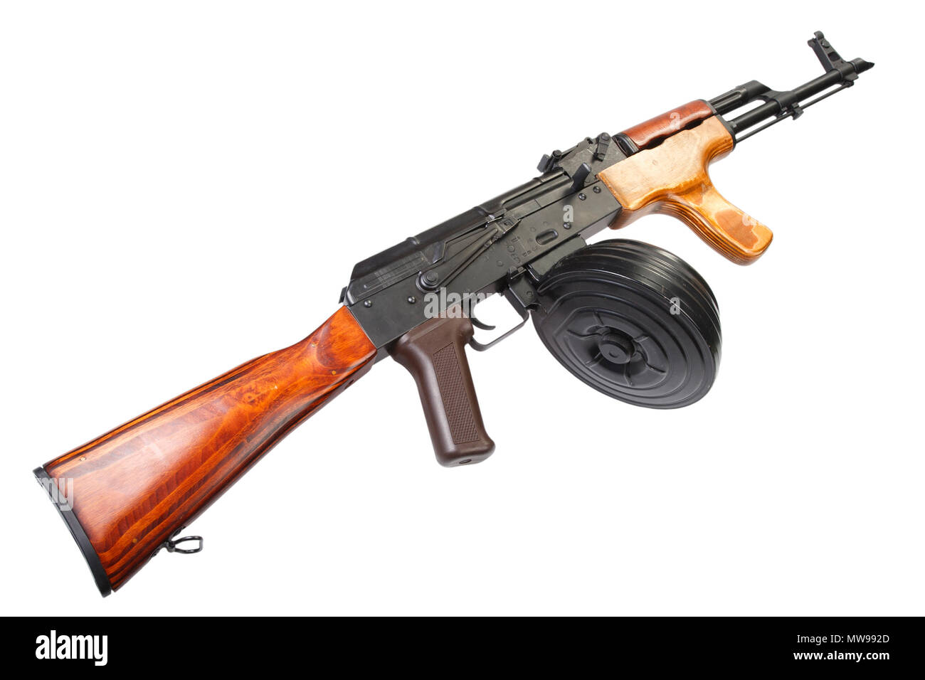 AK 47 assault rifle with round drum magazine isolated Stock Photo - Alamy