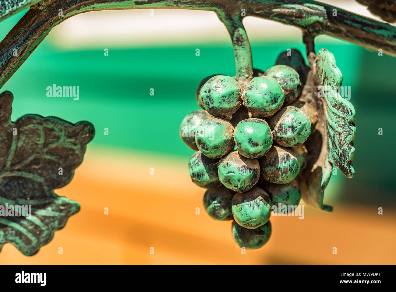 Forged metal bunch of grapes interior decoration Stock Photo - Alamy