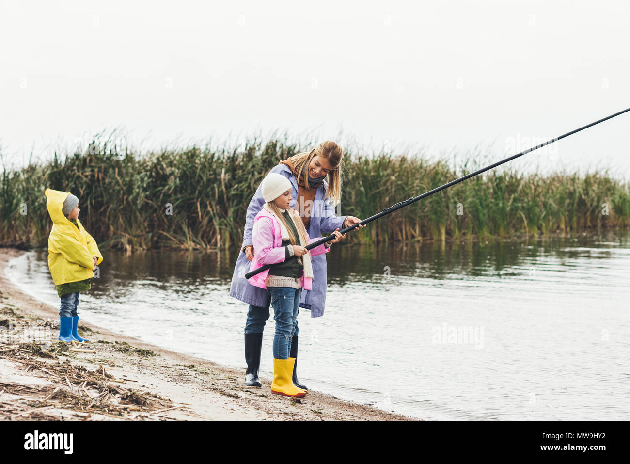 Mom And Little Girl Fishing High Resolution Stock Photography and ...