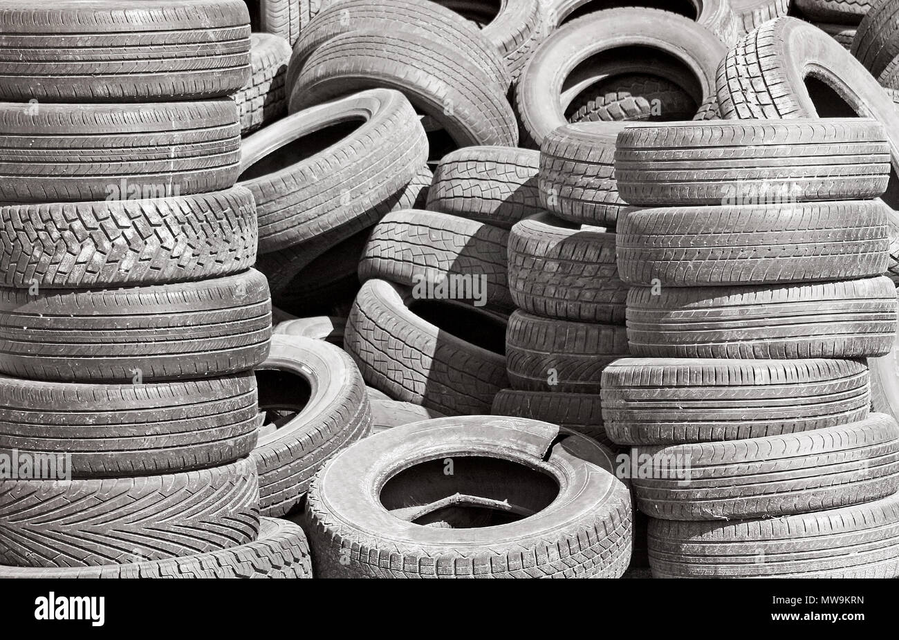 Old worn and used tires ready for recycling Stock Photo - Alamy