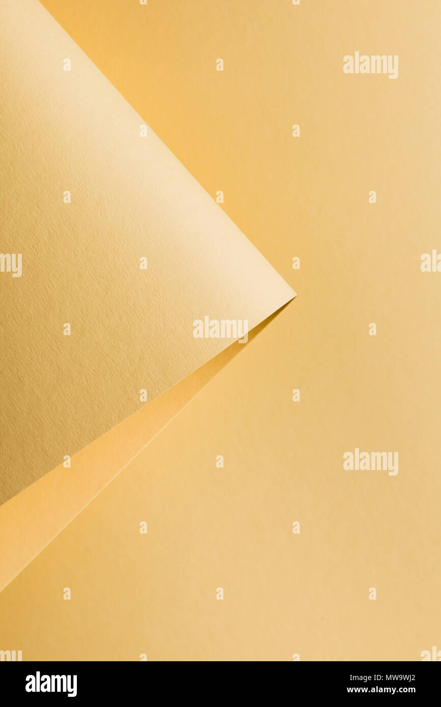 close-up view of rolled yellow paper sheet abstract background Stock ...