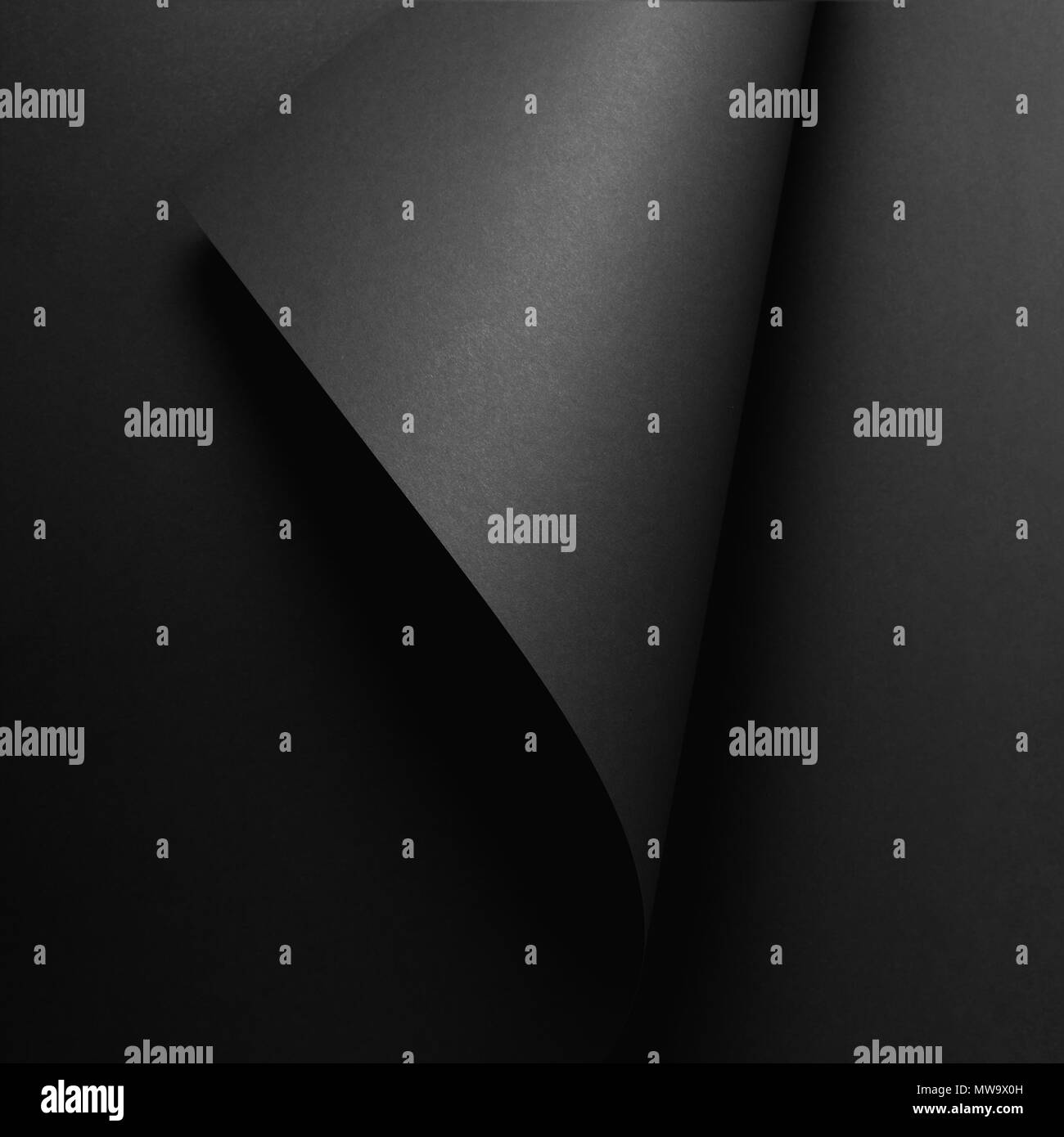 dark paper sheet and black abstract background Stock Photo - Alamy