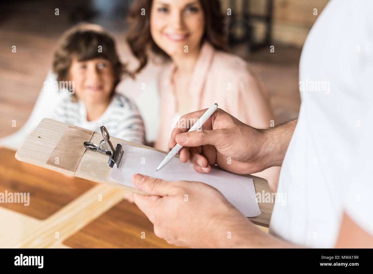 Child write list parent hi-res stock photography and images - Alamy
