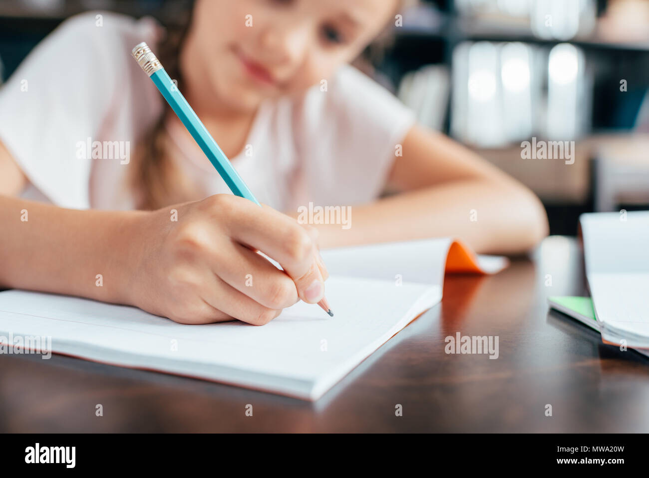 cute cute little girl doing homework Stock Photo - Alamy