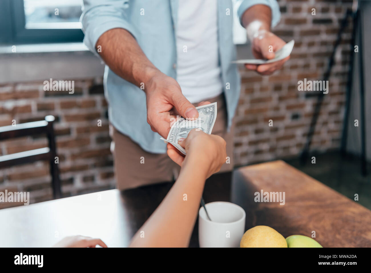 Father giving daughter money hi-res stock photography and images - Alamy