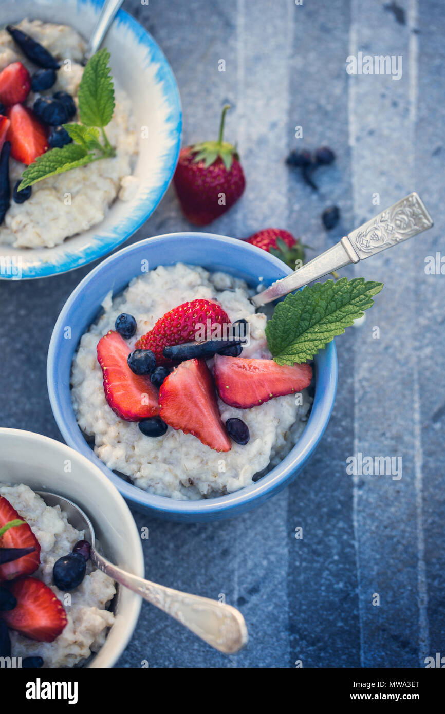 Oatmeal porridge with spring strawberry Stock Photo - Alamy