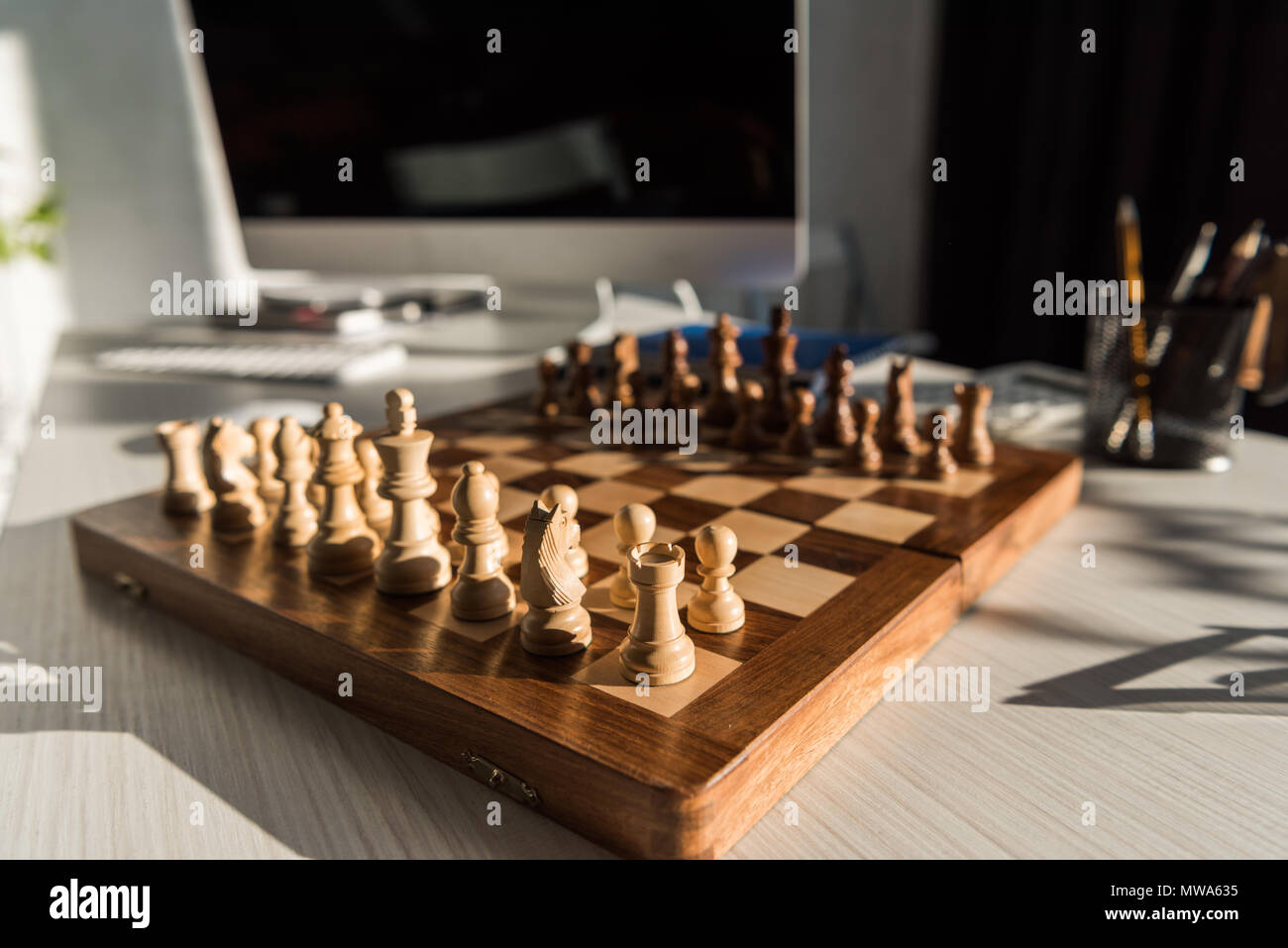 close-up shot of chess board at office workplace Stock Photo - Alamy
