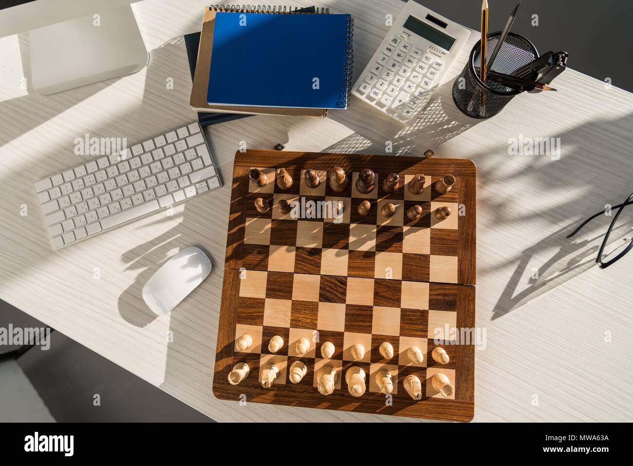flat lay chess board at workplace with computer keyboard Stock Photo ...