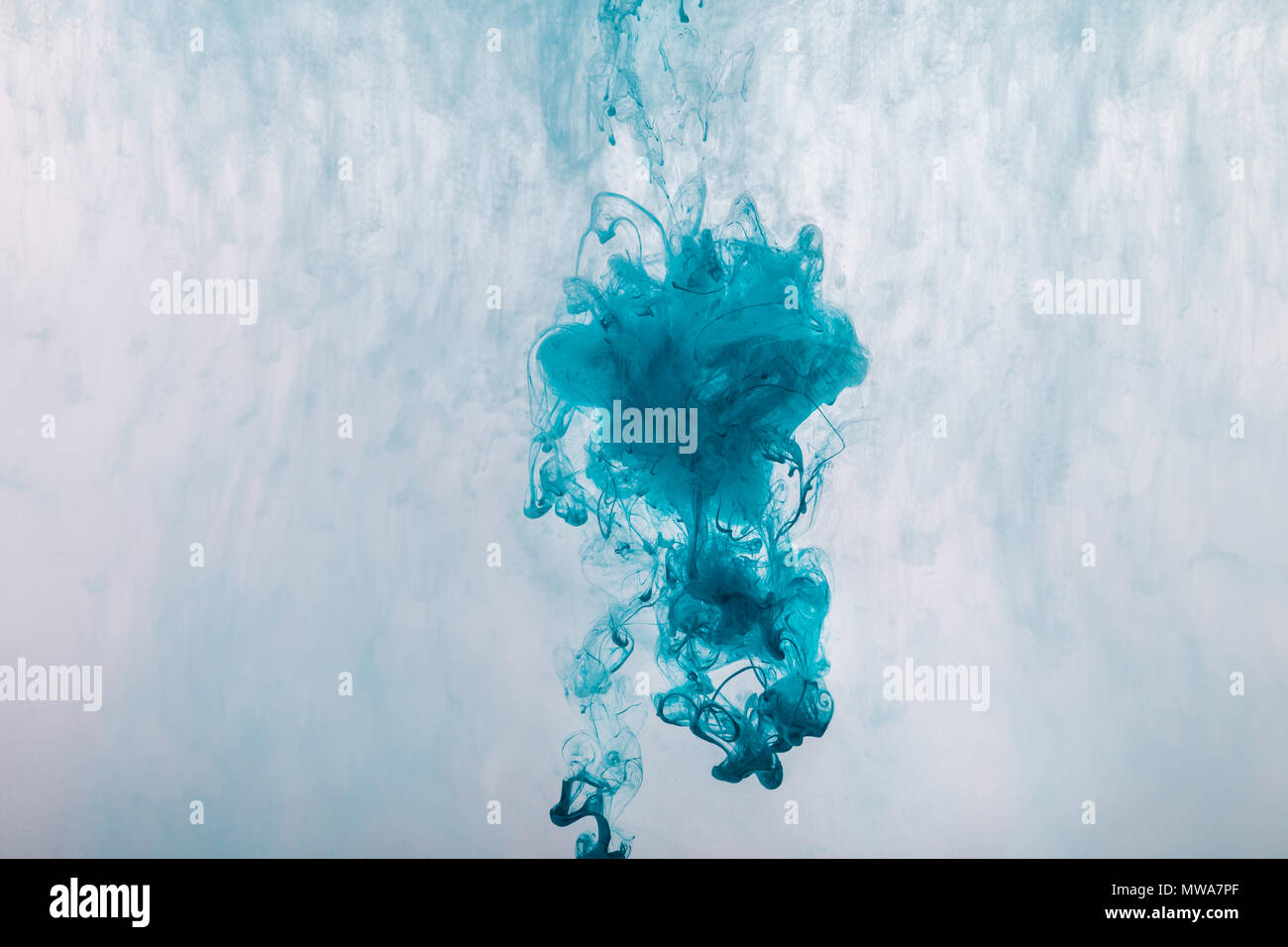 creative design with blue paint splash in water Stock Photo - Alamy