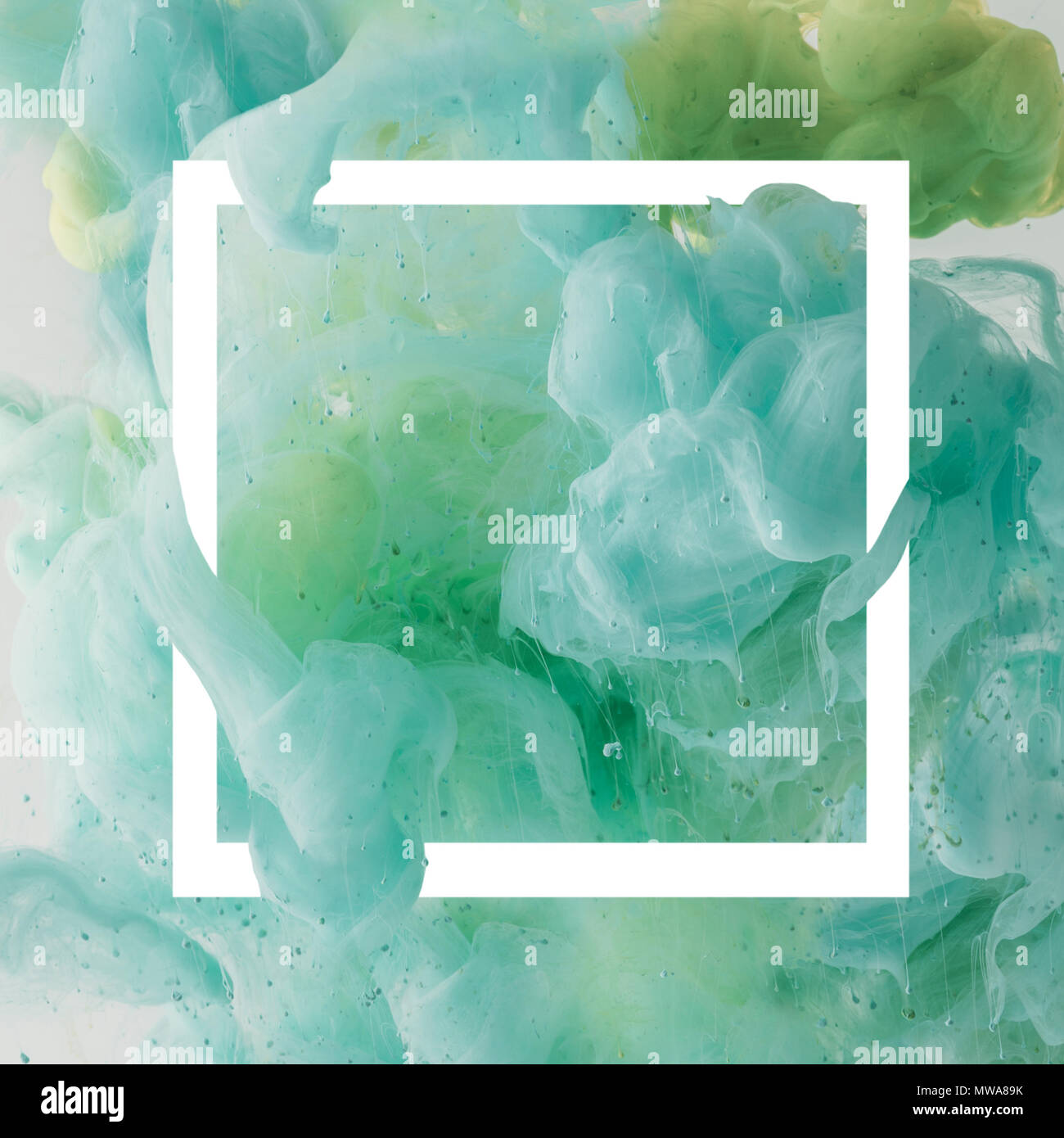 creative design with flowing turquoise paint in white square frame ...