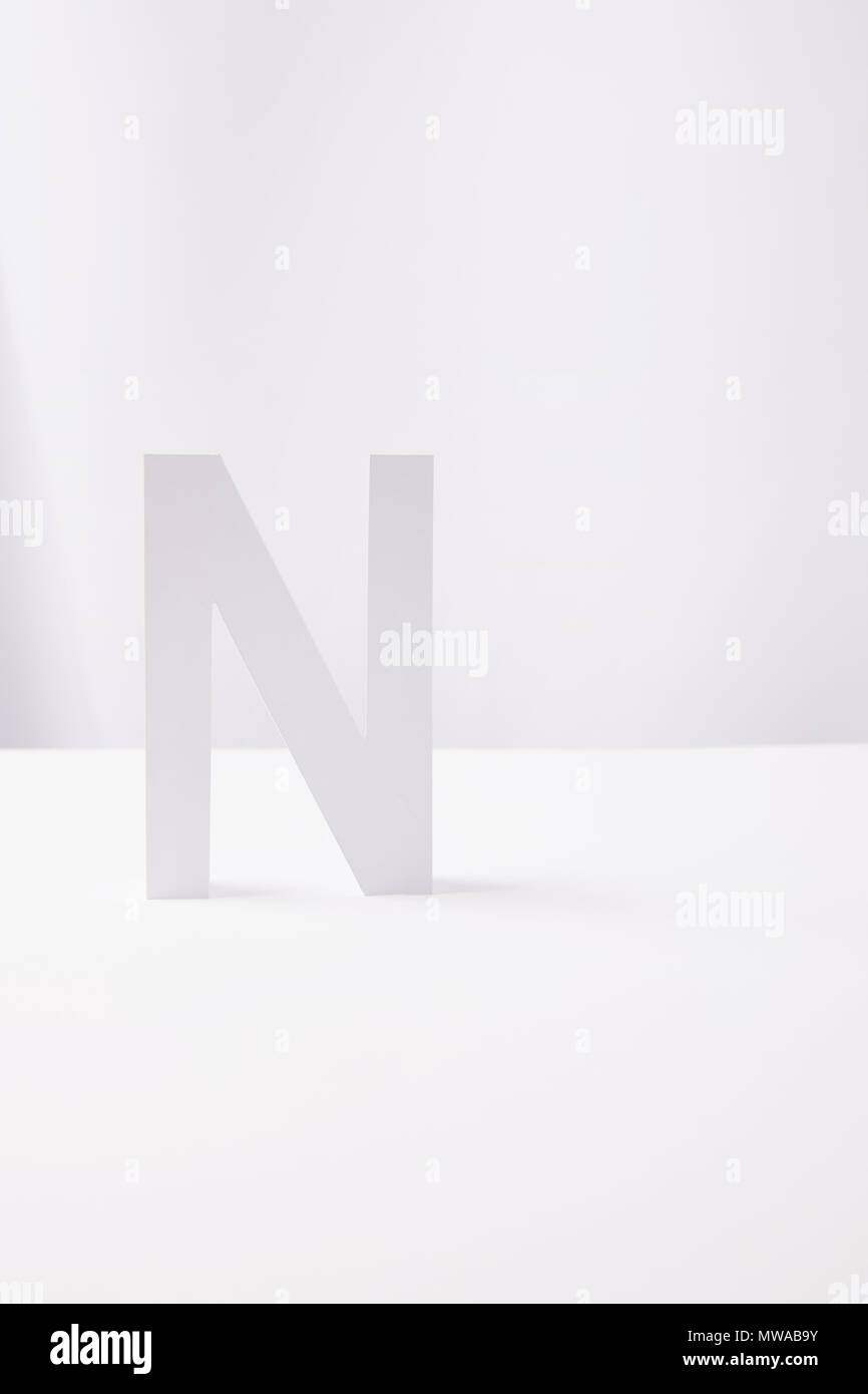 letter N made of paper, on white background with copy space Stock Photo ...