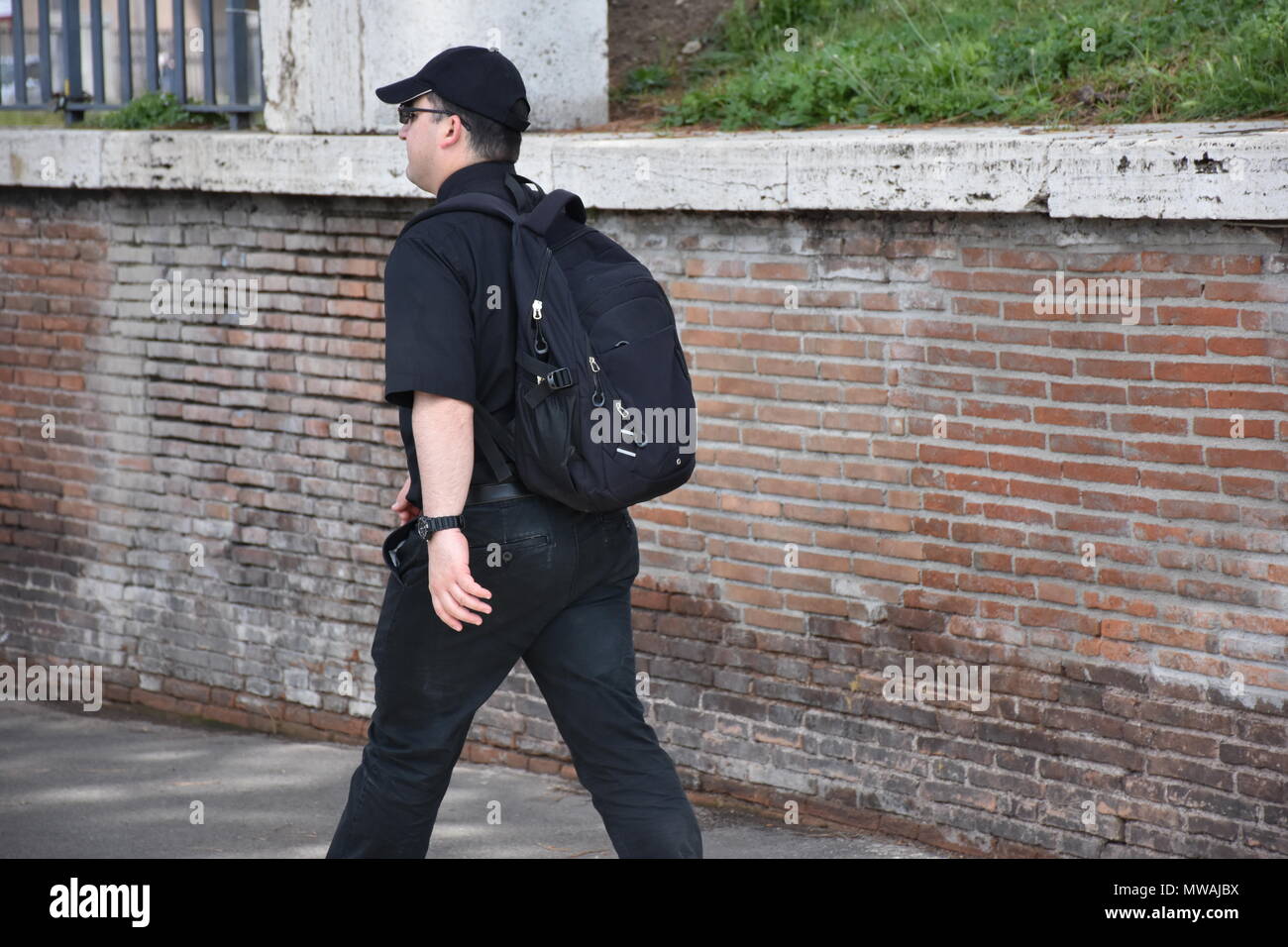 Rome, 18 May 2018, modern priest walks the streets of the Vatican Stock ...