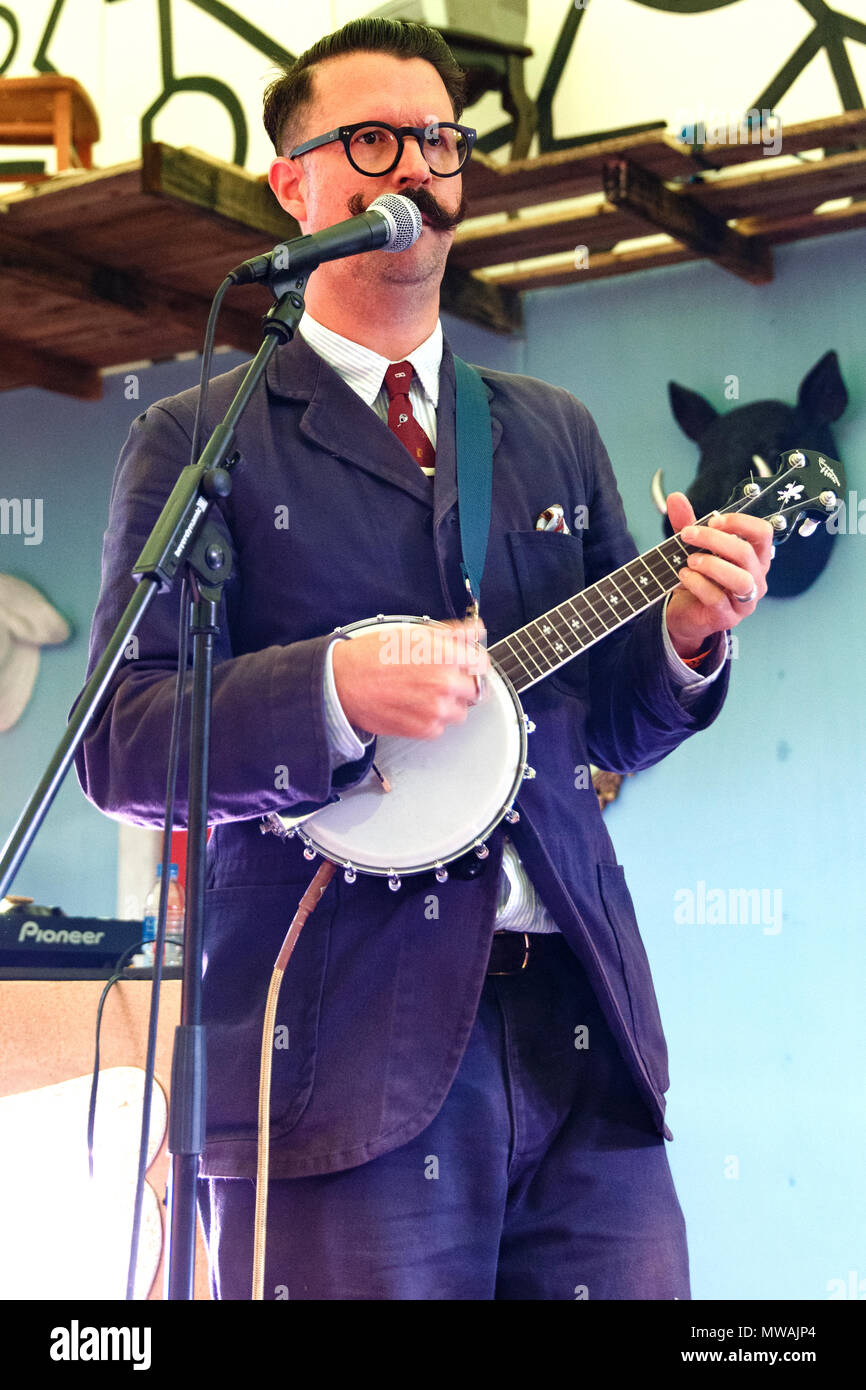 Chap-hop musician Mr.B The Gentleman Rhymer performing live with his ...
