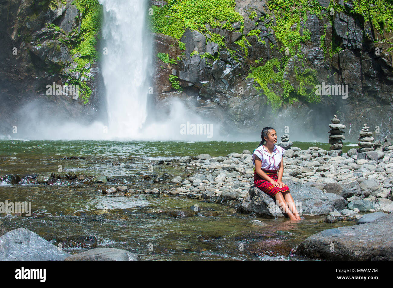 Girl from Ifugao Minority near a waterfall in Batad the Philippines ...