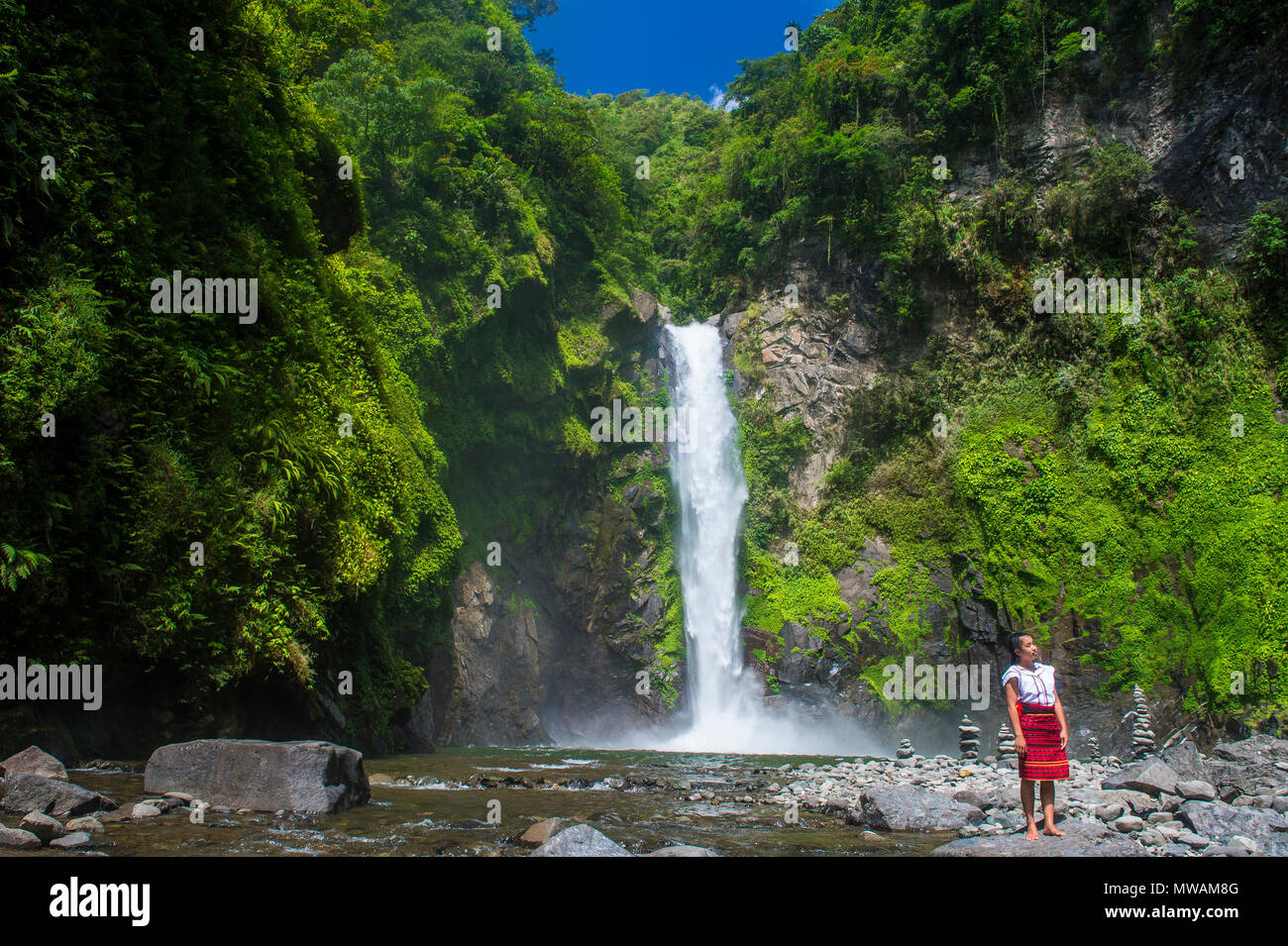 Girl from Ifugao Minority near a waterfall in Batad the Philippines ...