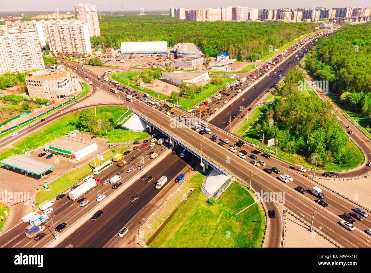 Aerial view of a freeway intersection. Road junctions in a big city ...