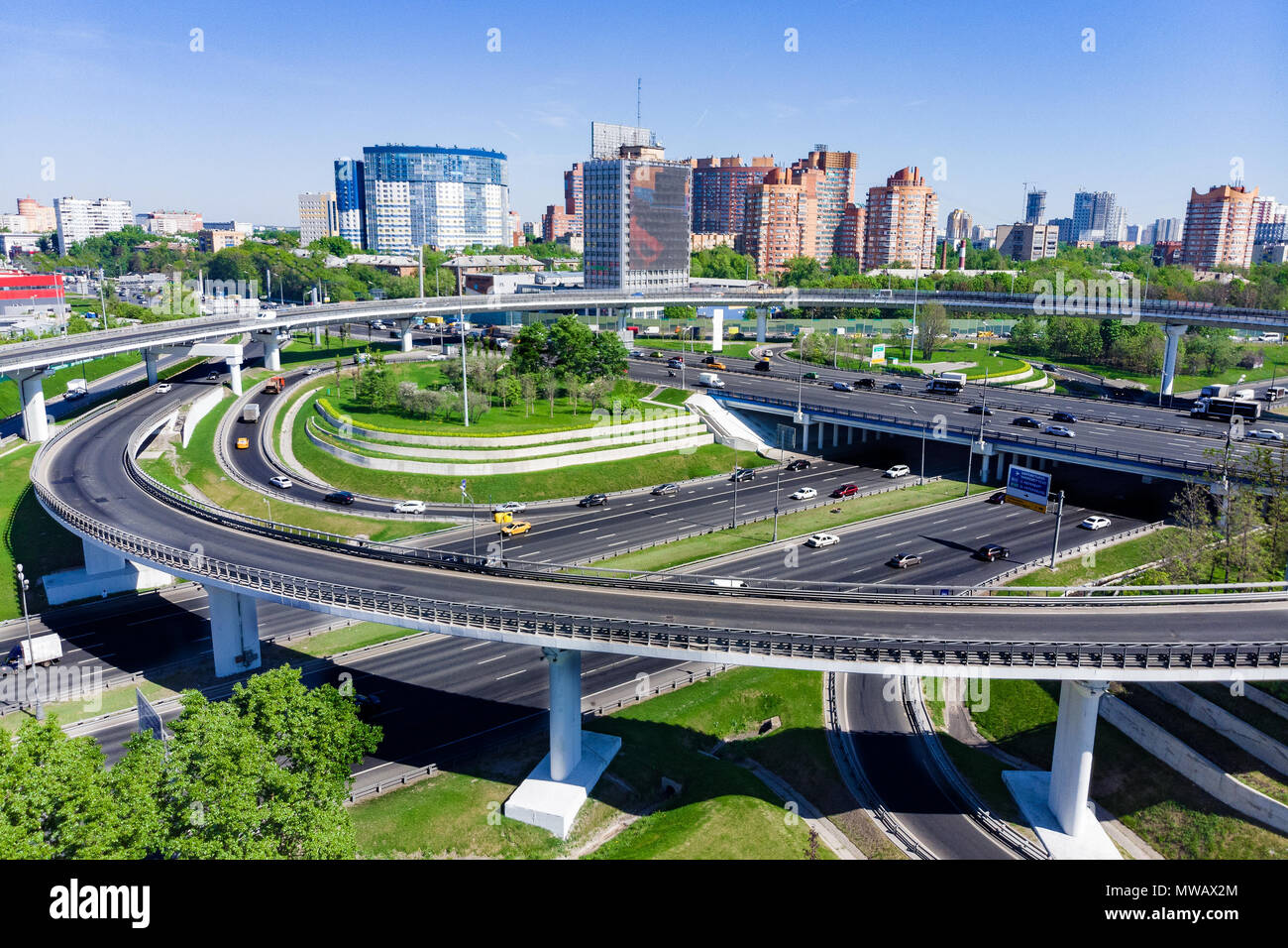 Aerial view of a freeway intersection. Road junctions in a big city ...