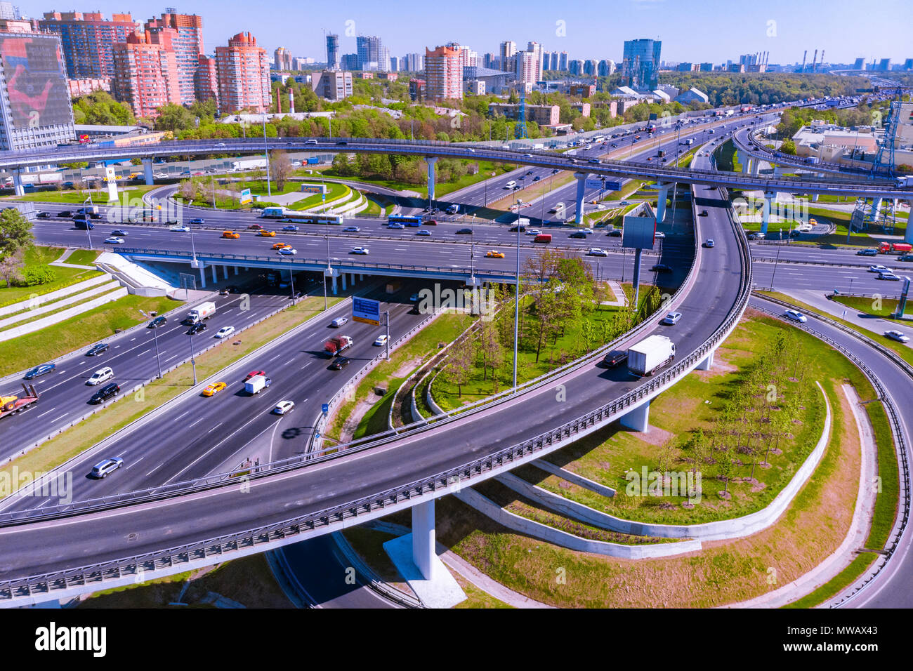 Aerial view of a freeway intersection. Road junctions in a big city ...