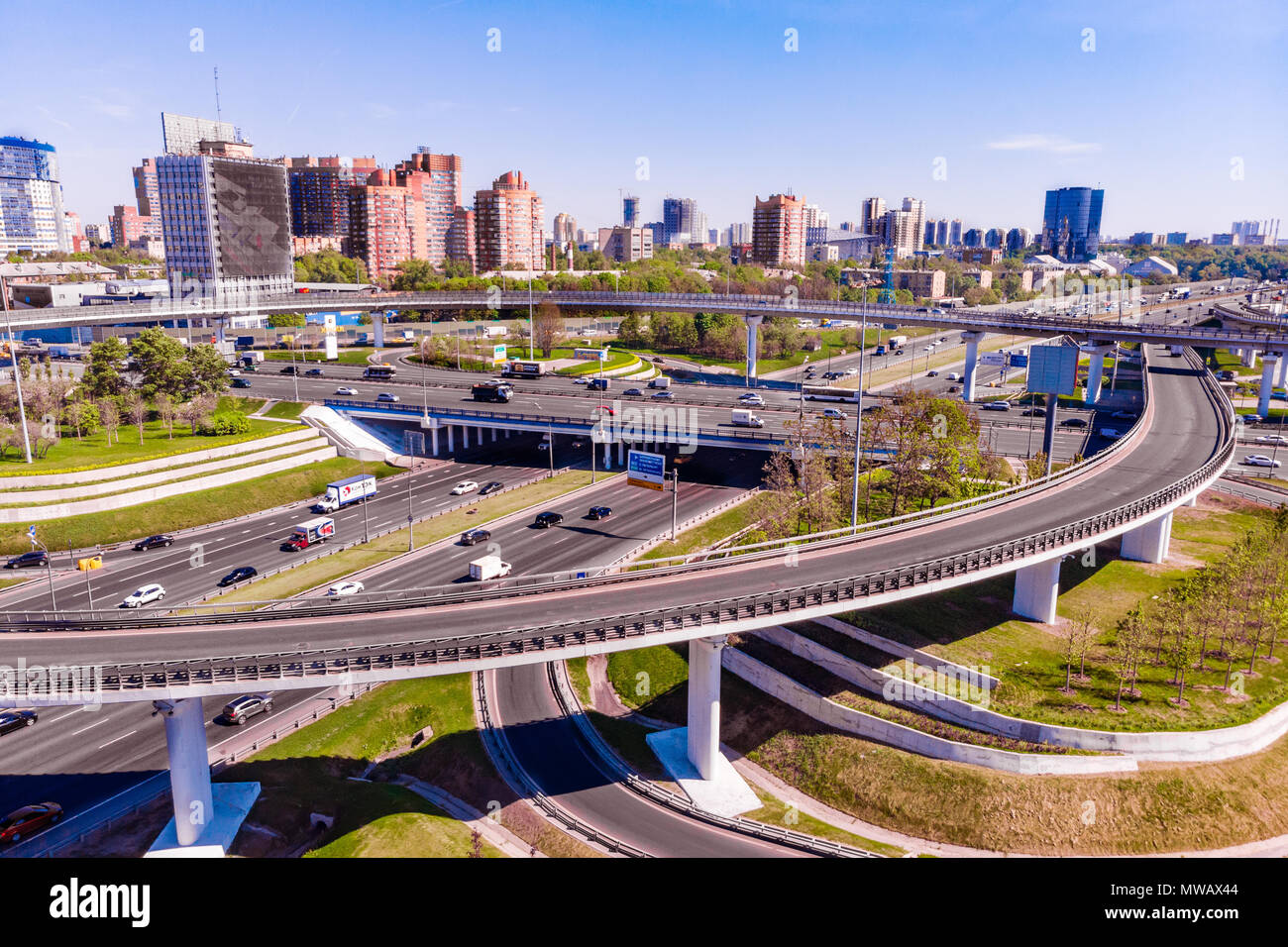 Aerial view of a freeway intersection. Road junctions in a big city ...