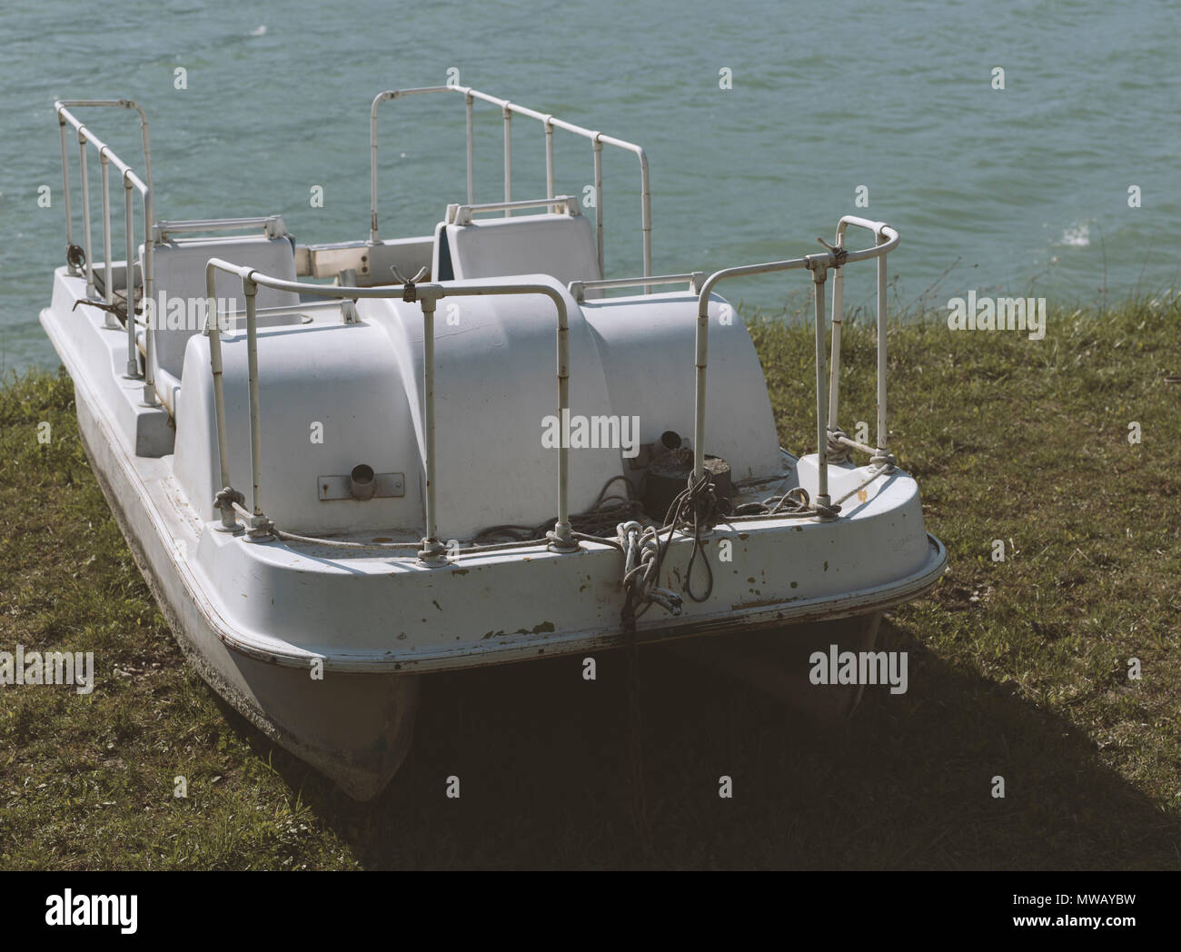 Paddle boat on the lake beach, summer and outdoors concept Stock Photo ...