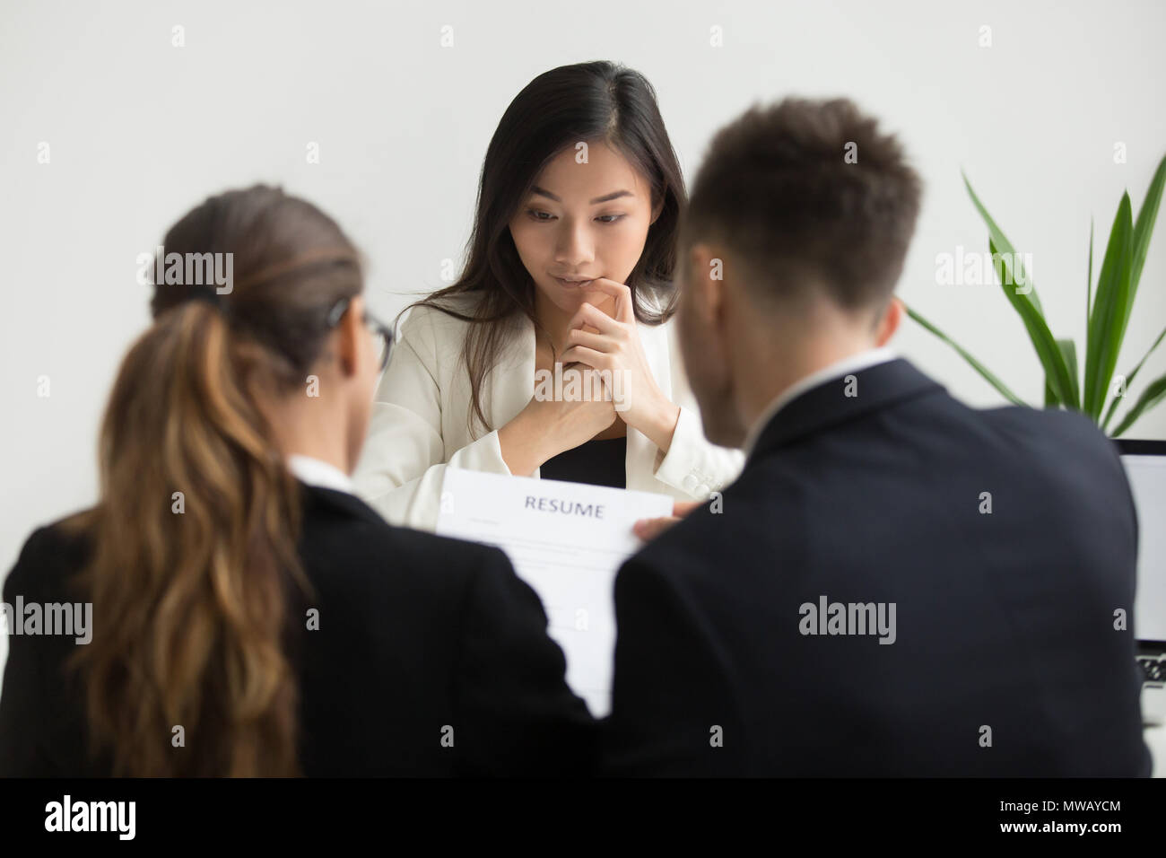 Asian female applicant feeling nervous stressed at job interview Stock ... Asian female applicant feeling nervous stressed at job interview Stock ...
