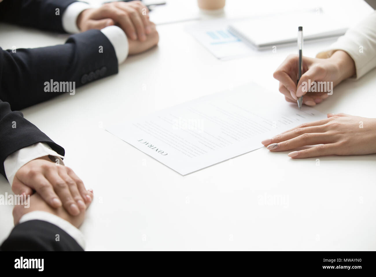 Business agreement signing businesswoman hi-res stock photography and ...