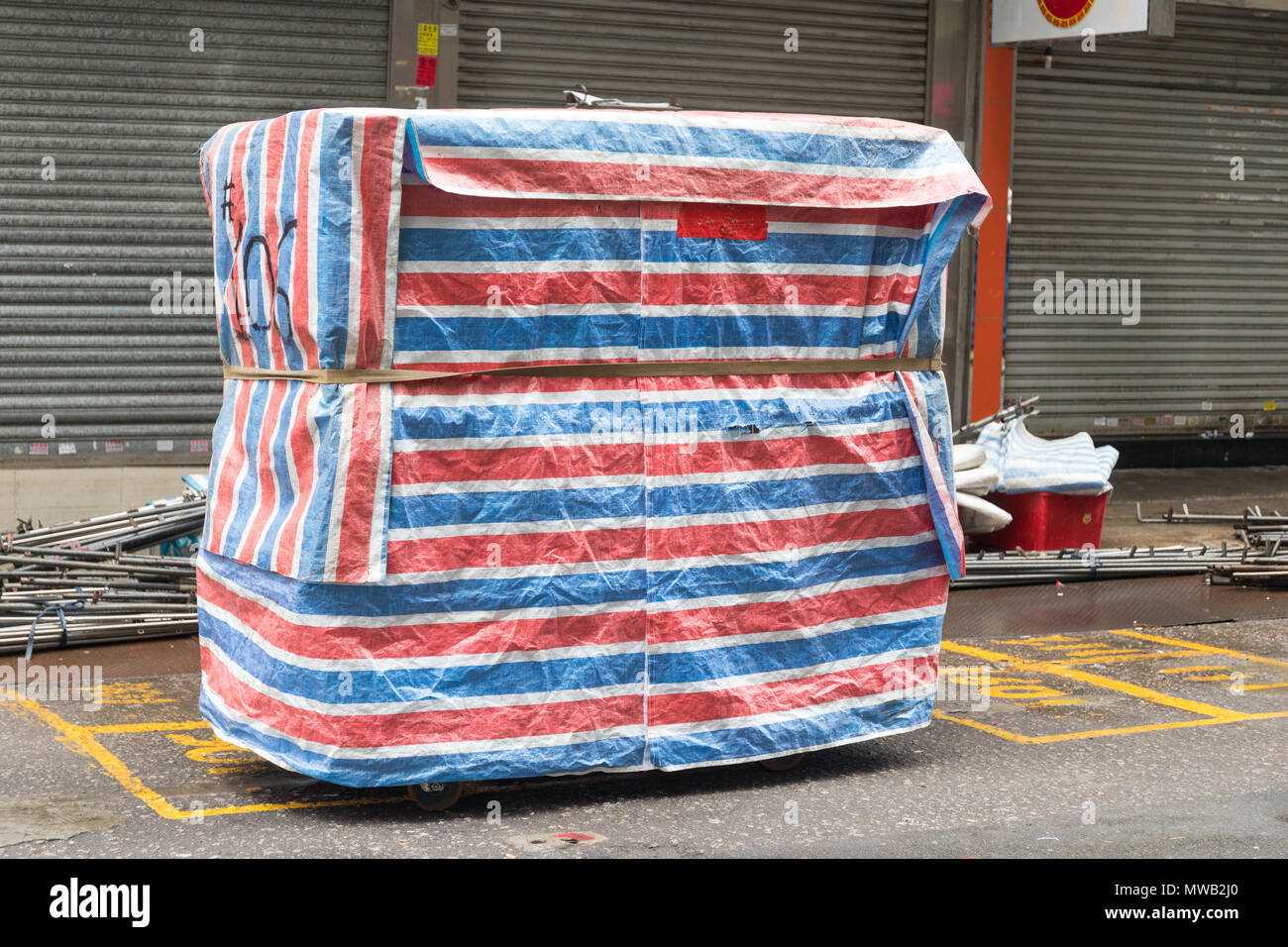Closed and Packed Street Market Stall in Kowloon Stock Photo - Alamy