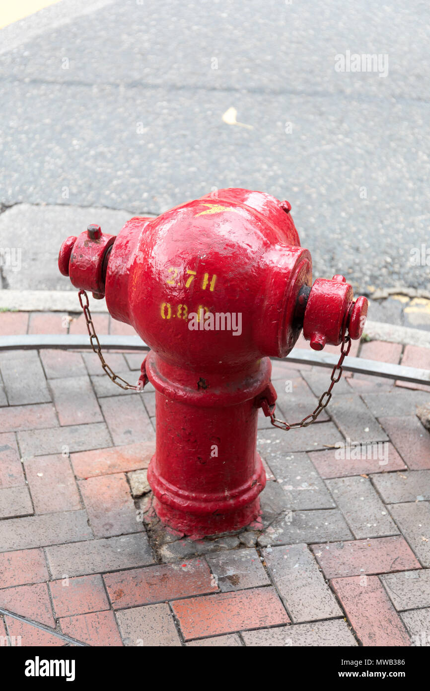 Red Fire Hydrant in Hong Kong Stock Photo - Alamy