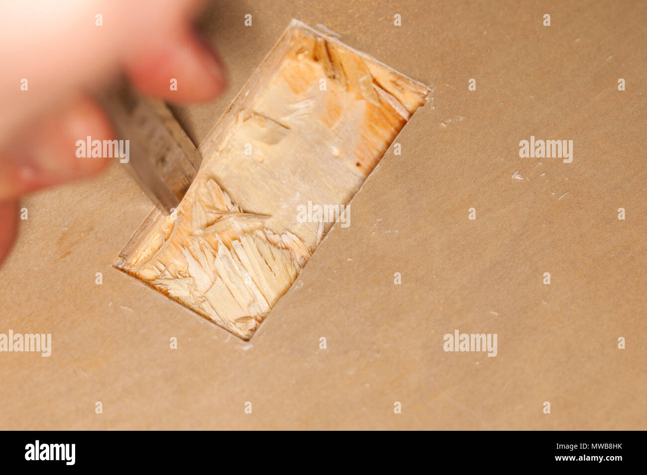 Using a chisel Stock Photo - Alamy