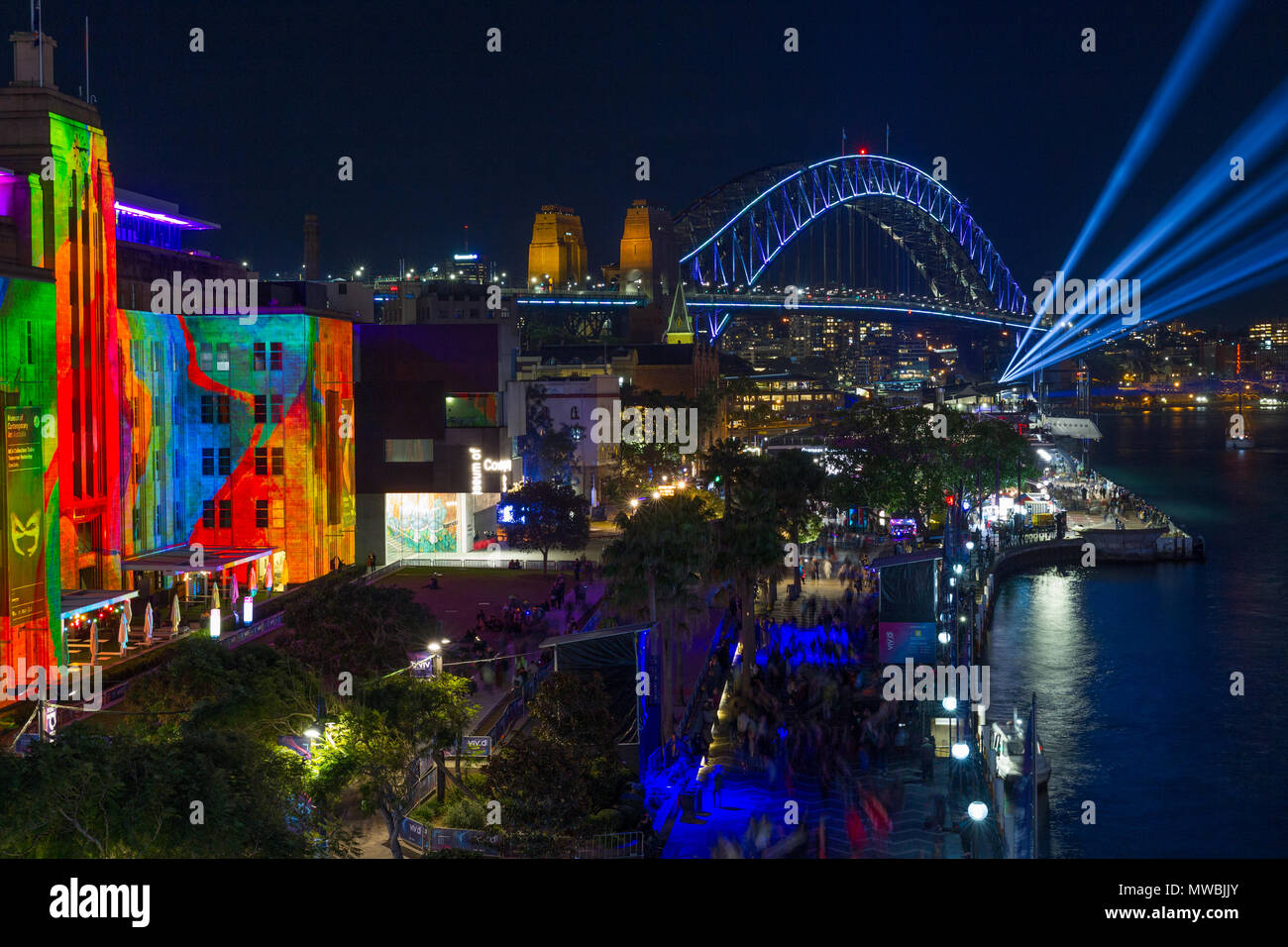 Special lighting adorns the arch of Sydney Harbour Bridge and the MCA ...