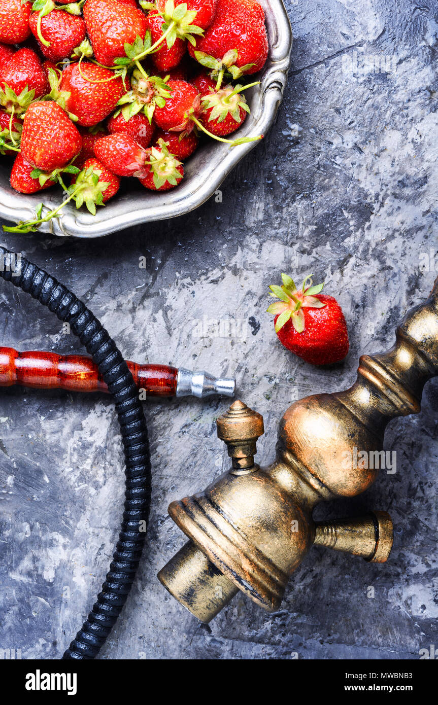 Oriental hookah with the aroma strawberry for relax.Strawberry shisha ...