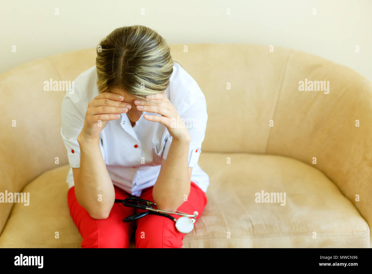 Crying unhappy upset medical nurse. Doctor sad and depressed having ...