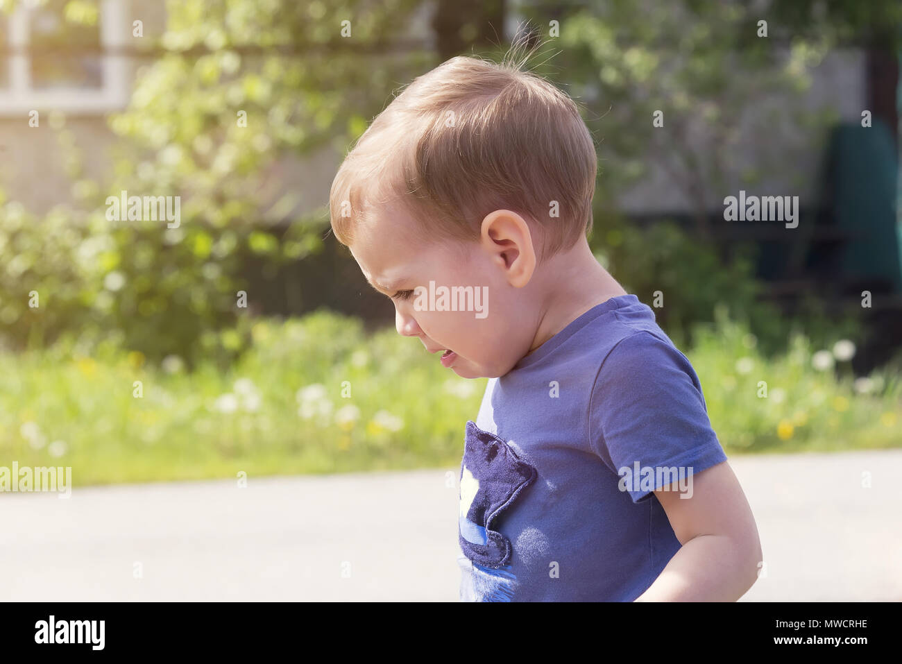 the child cries of resentment, sobs sobbingly covering his face with ...