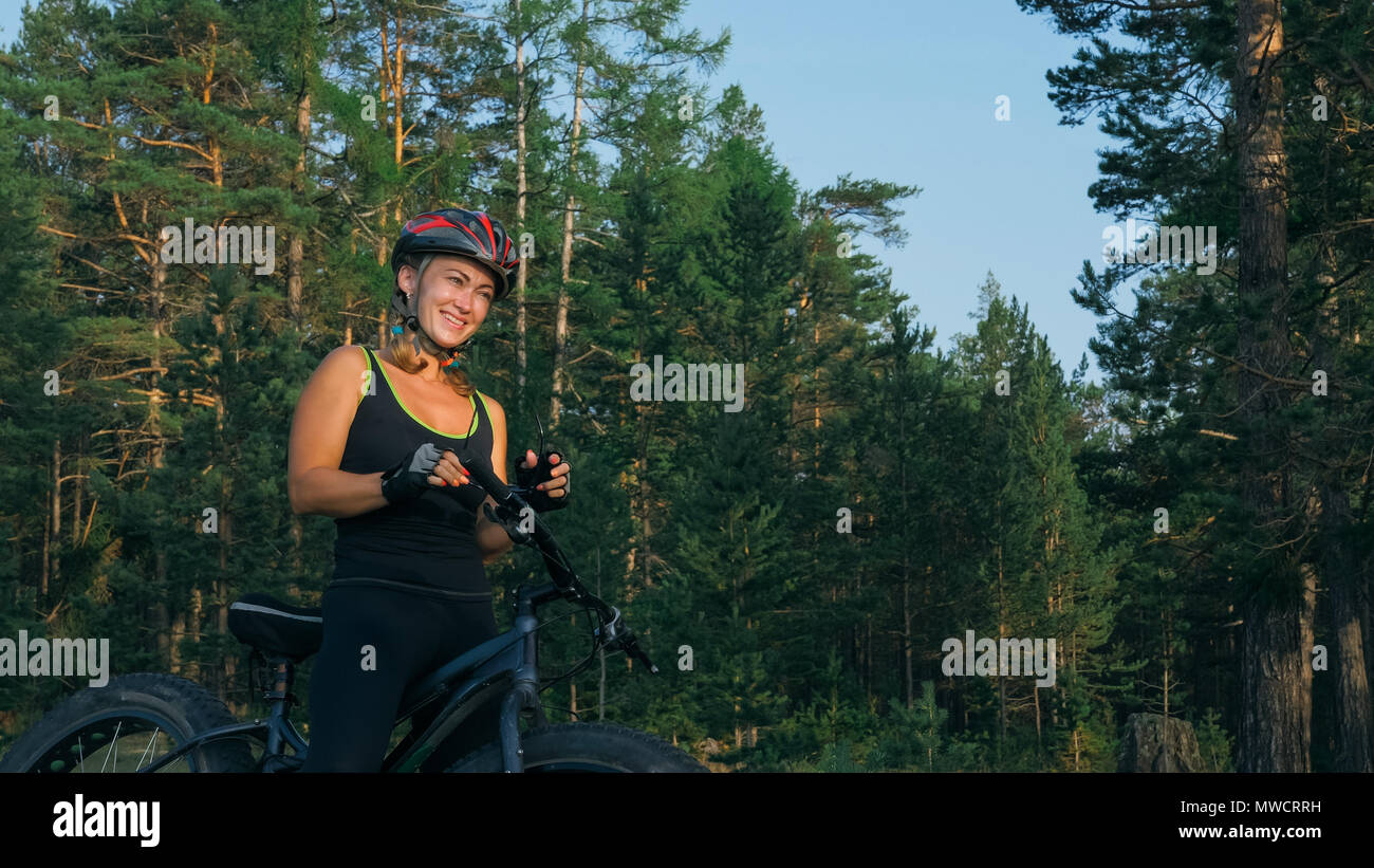 Fat bike also called fatbike or fat-tire bike in summer riding in the ...