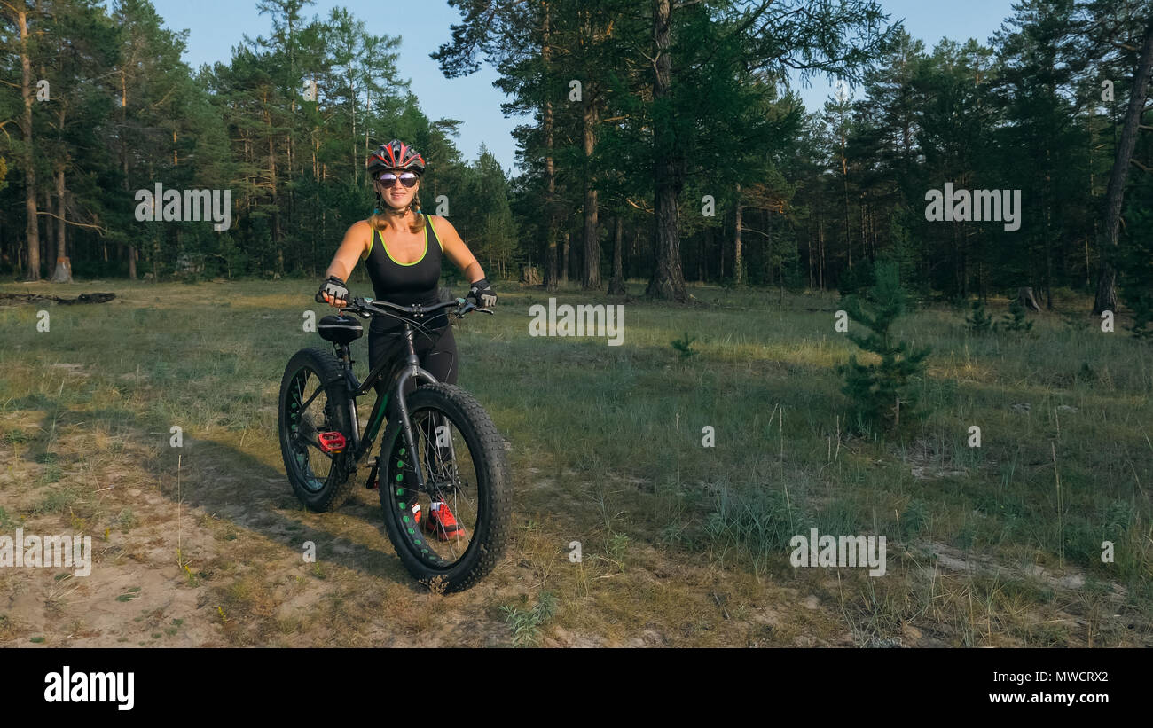 Fat bike also called fatbike or fat-tire bike in summer riding in the ...