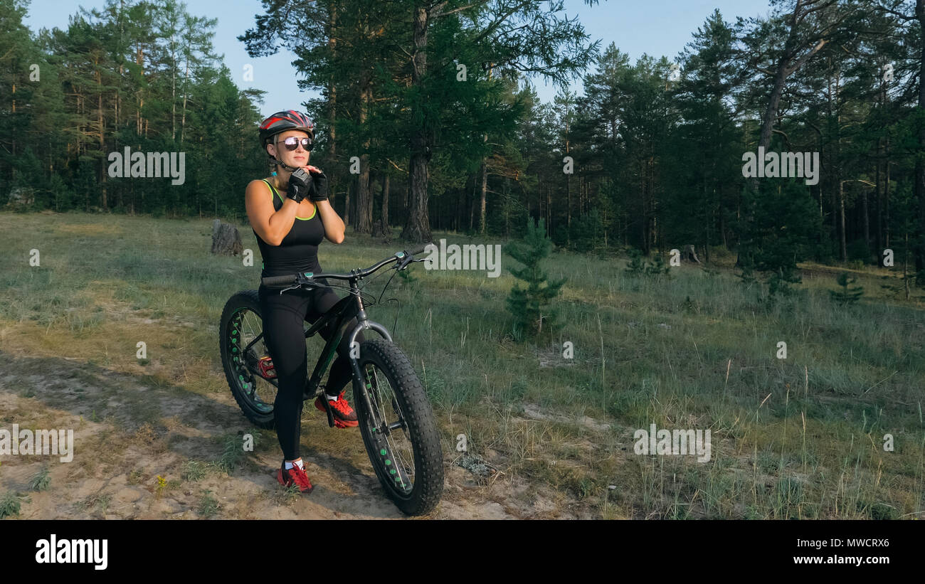Fat bike also called fatbike or fat-tire bike in summer riding in the ...