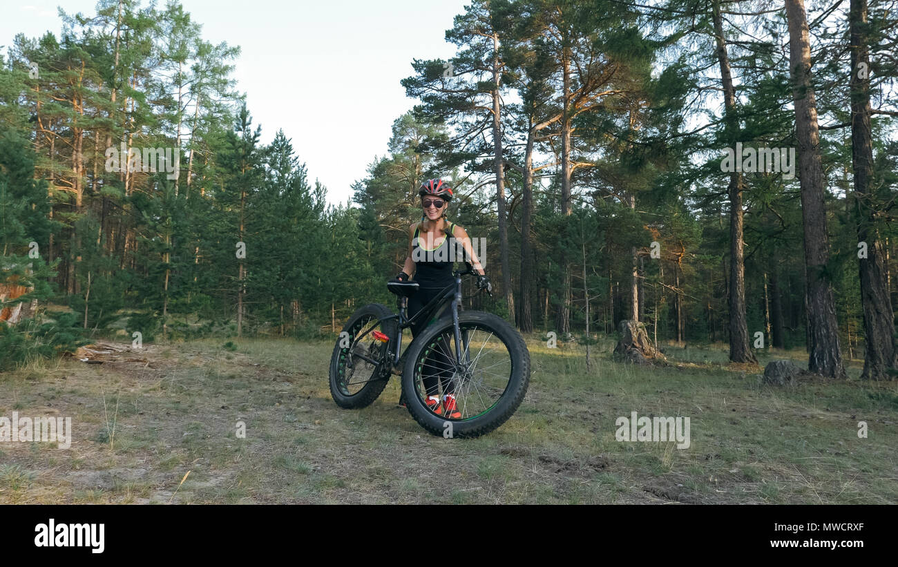 Fat bike also called fatbike or fat-tire bike in summer riding in the ...